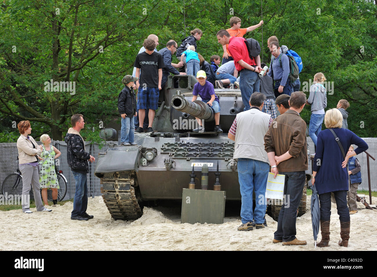 Visitors on Leopard 1 battle tank during open day of the Belgian army ...