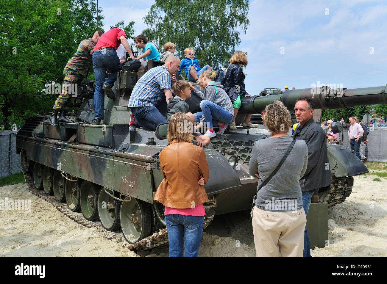 Visitors on Leopard 1 battle tank during open day of the Belgian army ...