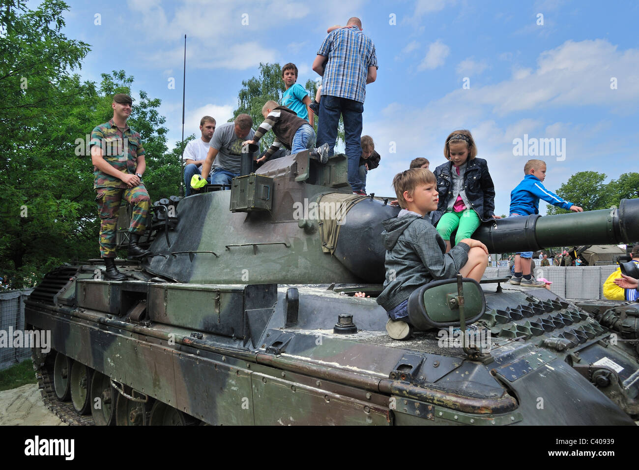 Visitors on Leopard 1 battle tank during open day of the Belgian army ...