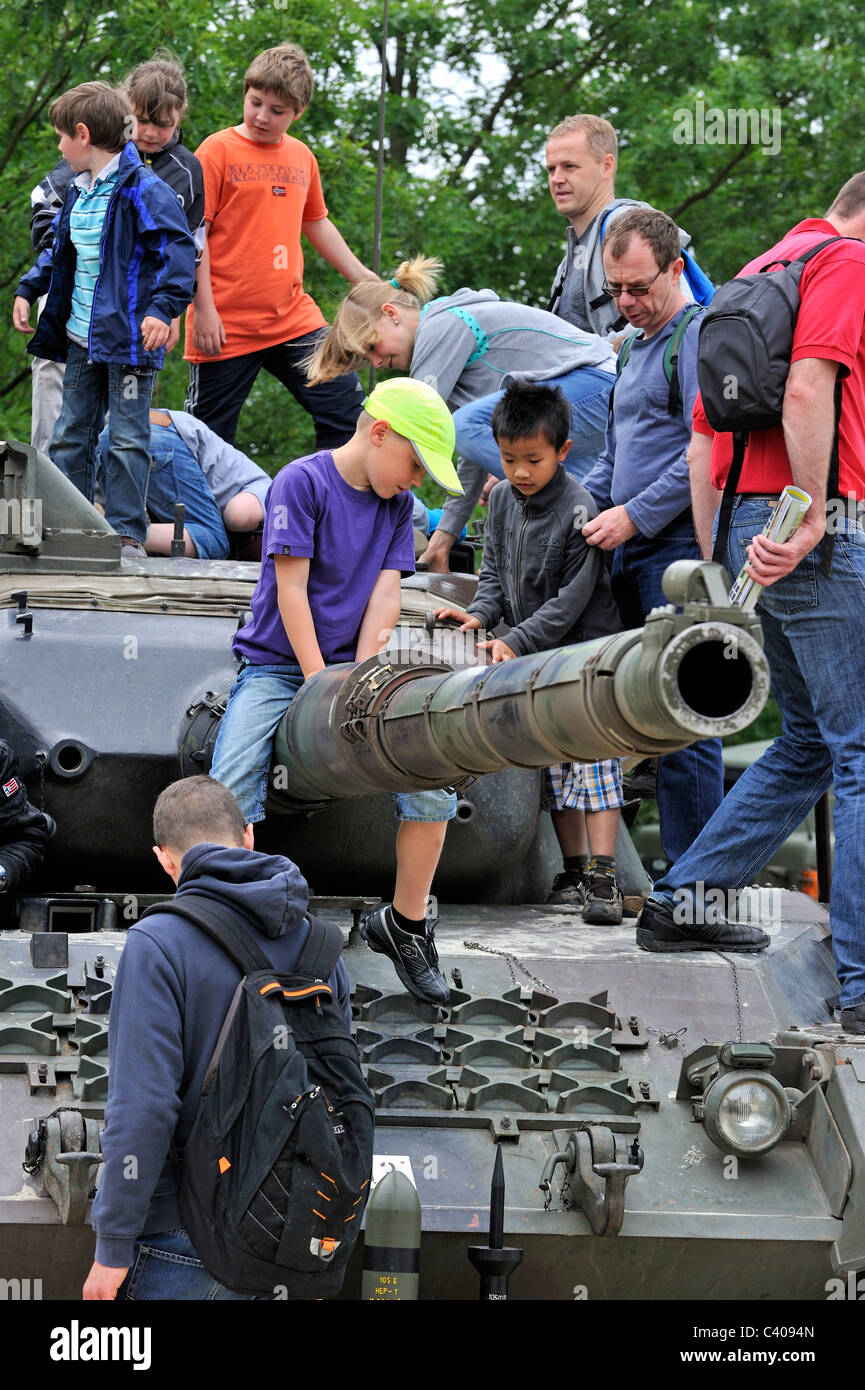 Visitors on Leopard 1 battle tank during open day of the Belgian army ...
