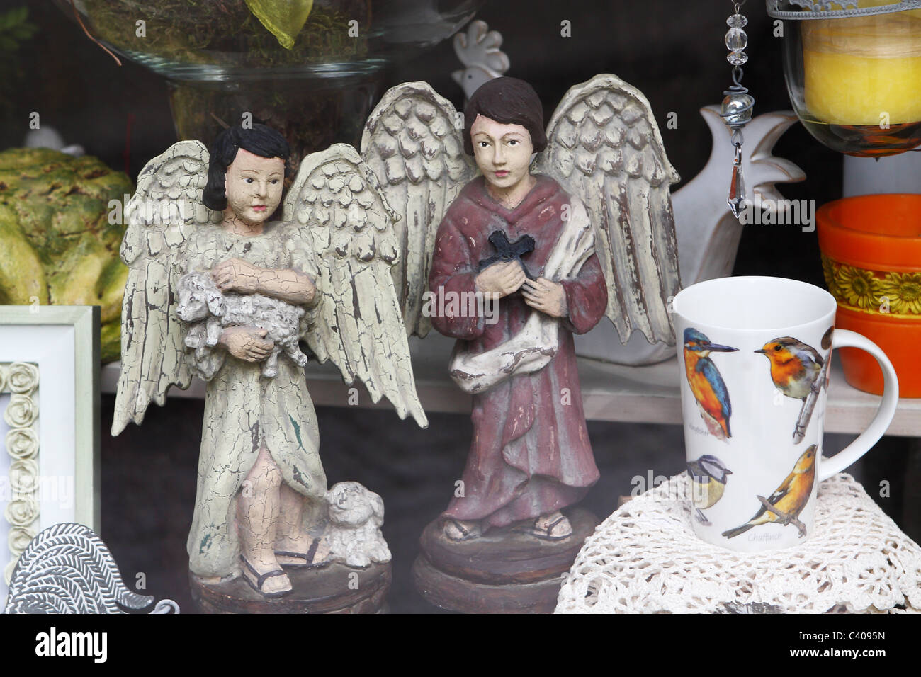 Angel figurines in a window exposition Stock Photo - Alamy
