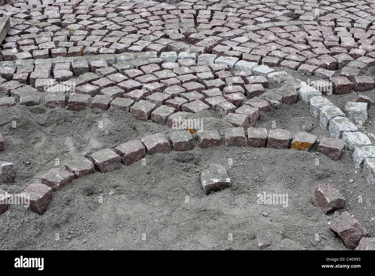 Close-up of pavement laying Stock Photo - Alamy