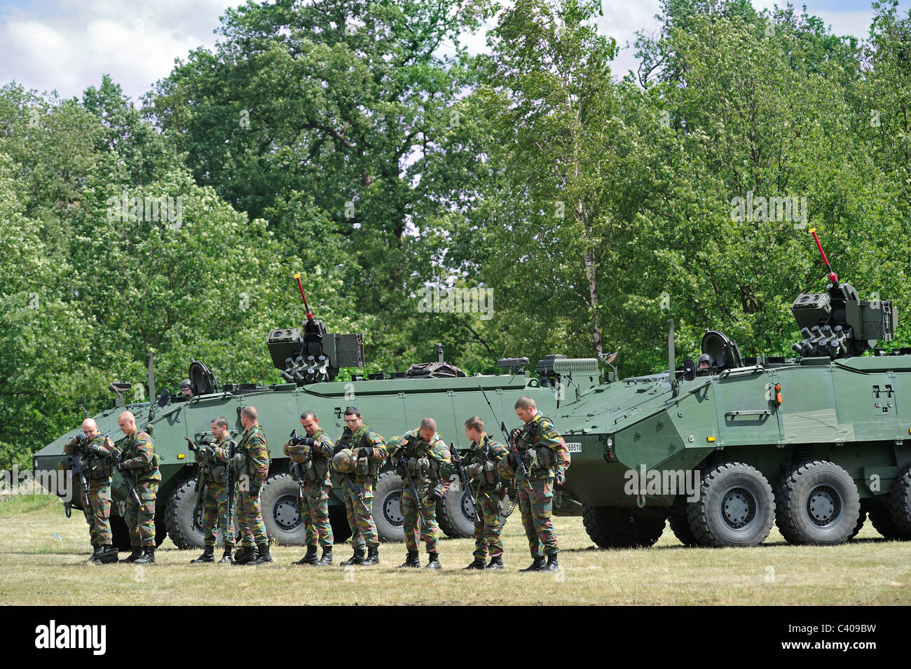 Platoon of Belgian infantry soldiers near MOWAG Piranha IIIC armoured ...