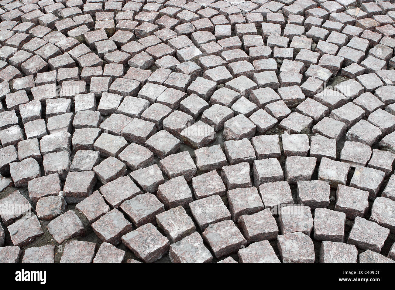 Close-up of pavement laying Stock Photo - Alamy