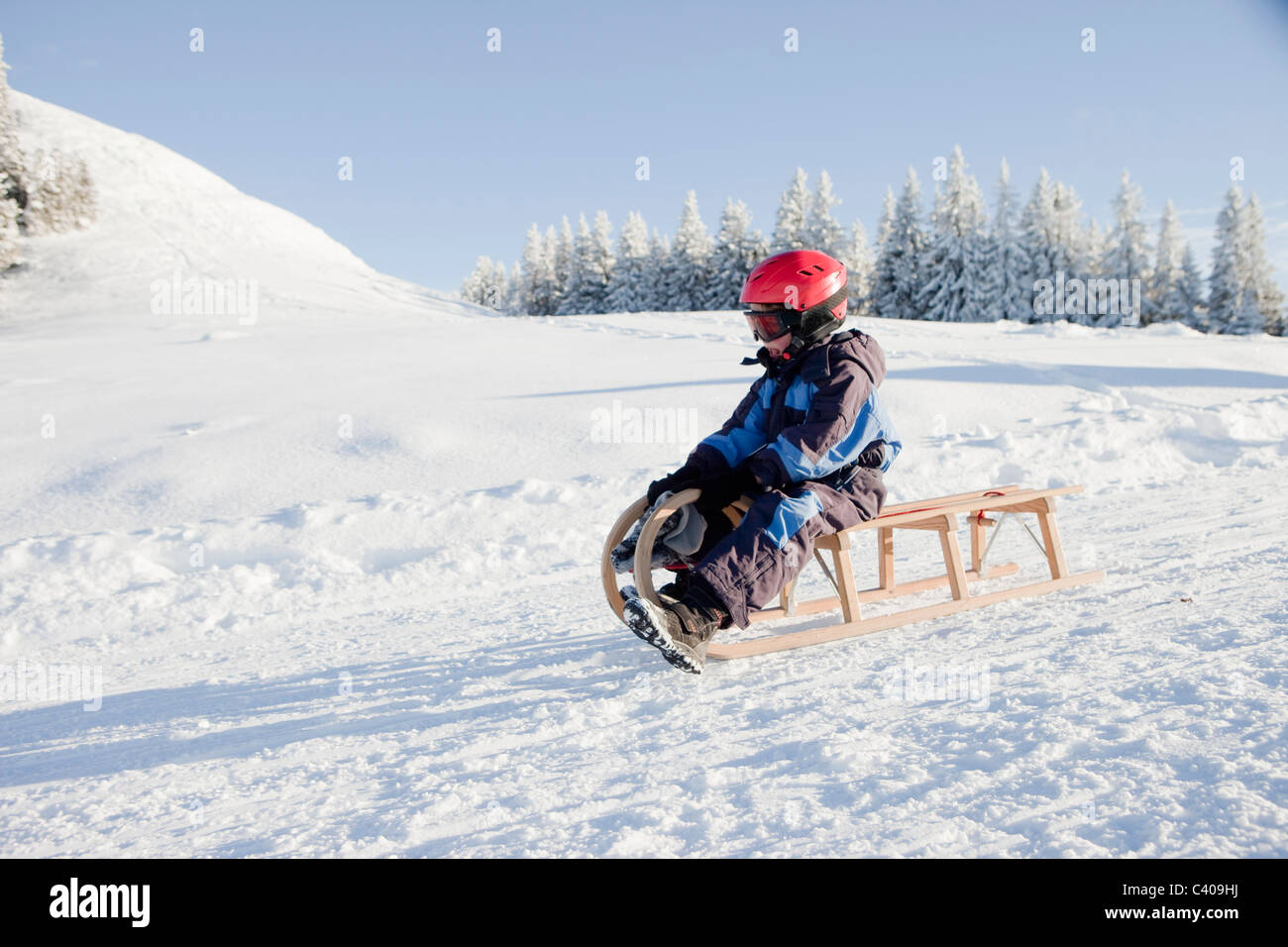 Boy With Sled High Resolution Stock Photography and Images - Alamy