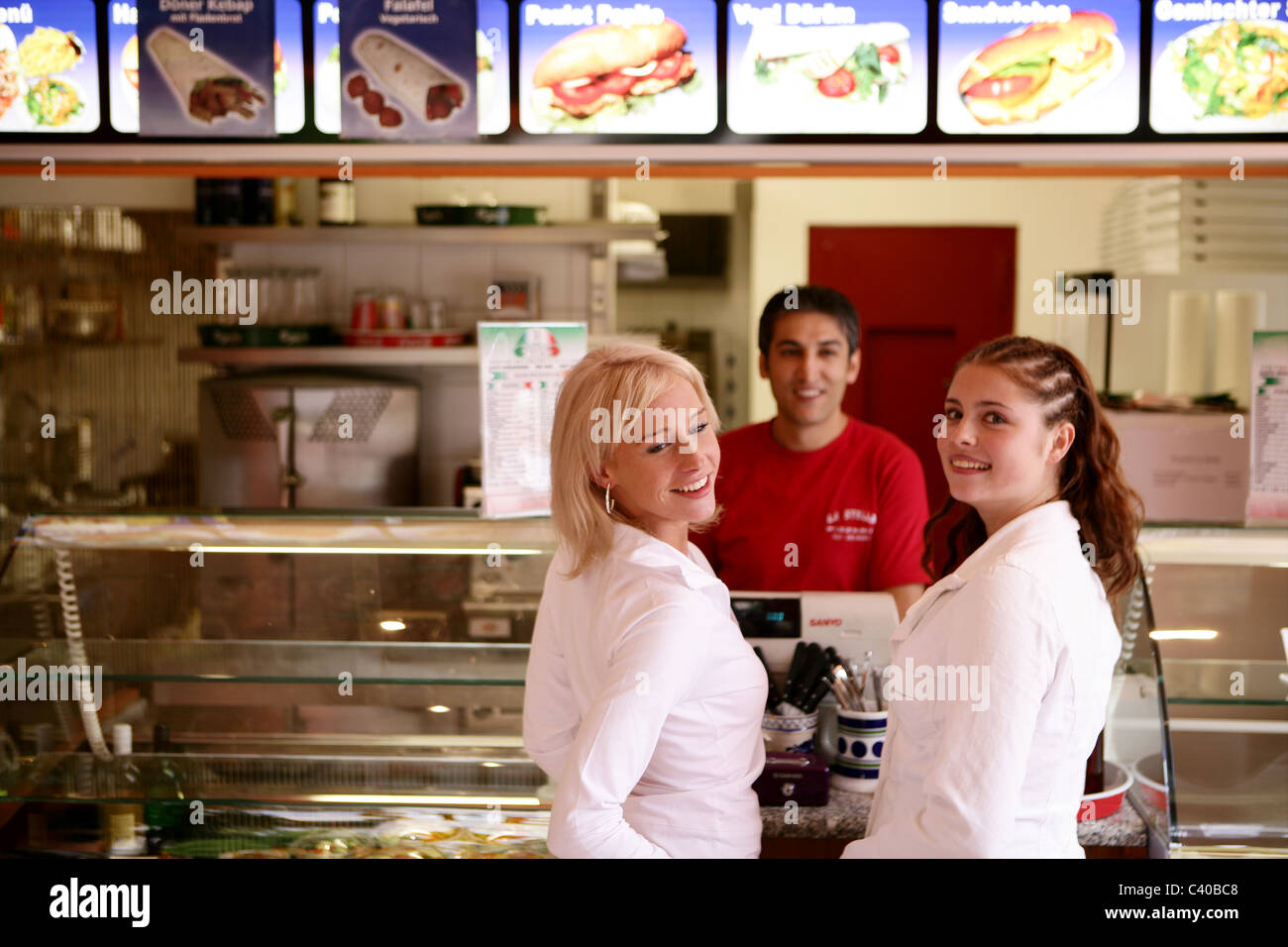 Teenagers Restaurant Waiter High Resolution Stock Photography and ...