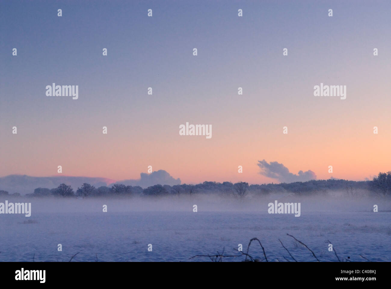 Misty sky with sun setting. Shaw Lane, Tadley, Hampshire, England, UK ...