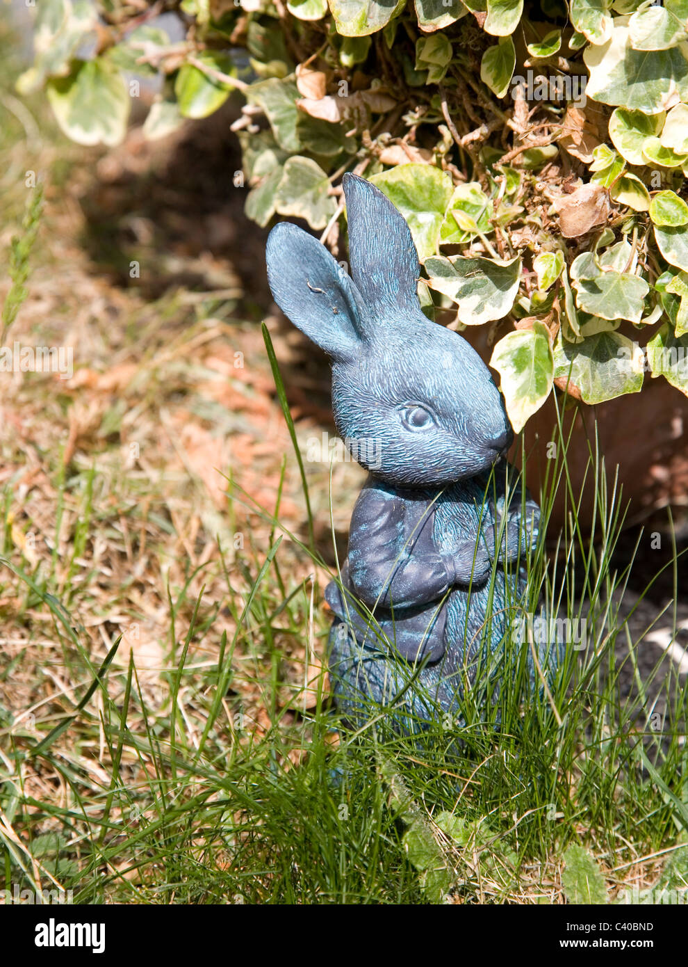 Figurine in plants hi-res stock photography and images - Alamy