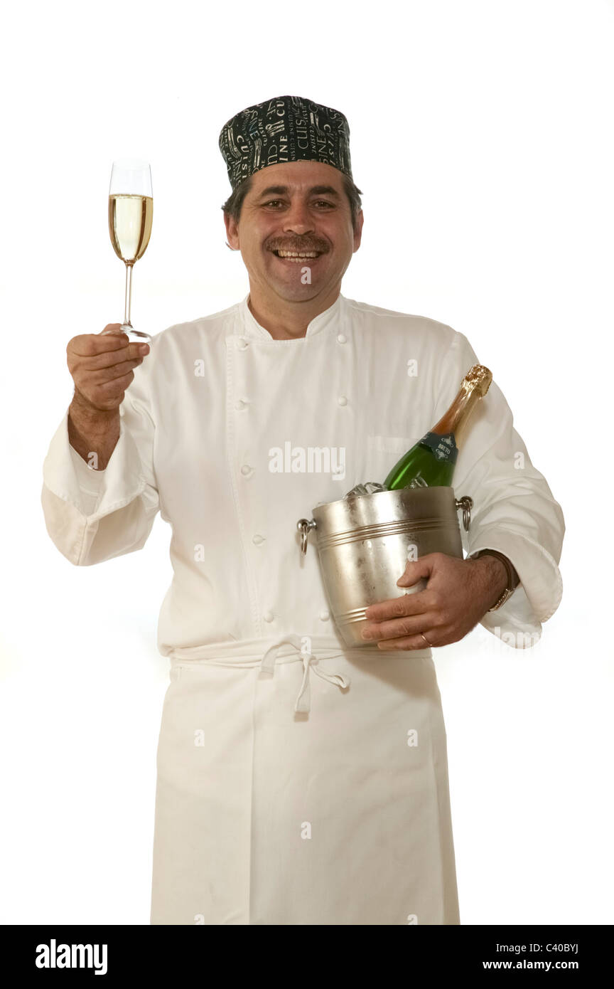 Chef holding Champagne glass and bottle on white background Stock Photo ...