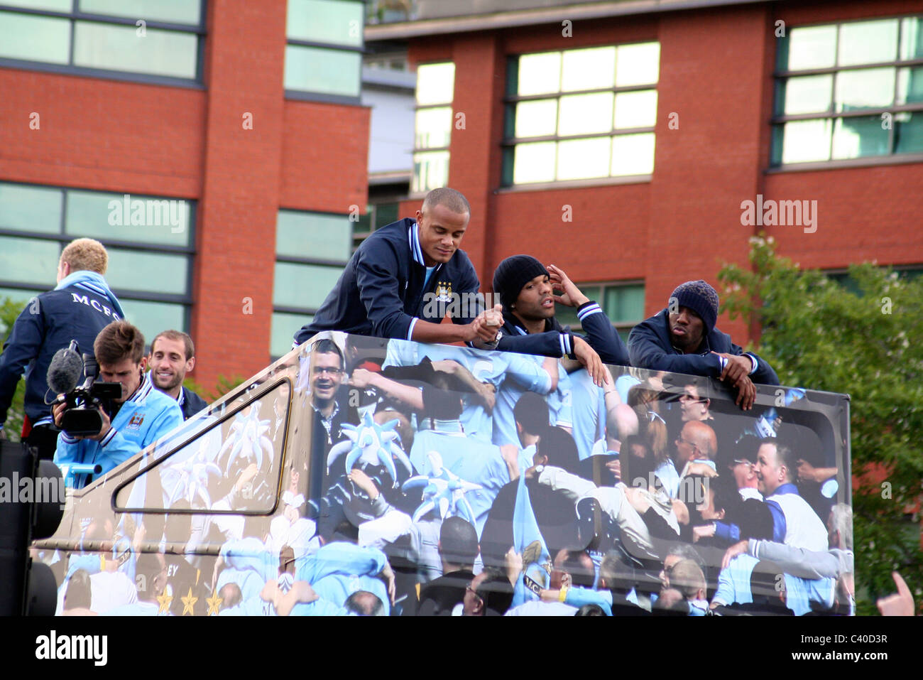 Manchester City Cup Parade tour bus and players, 2011 Stock Photo - Alamy