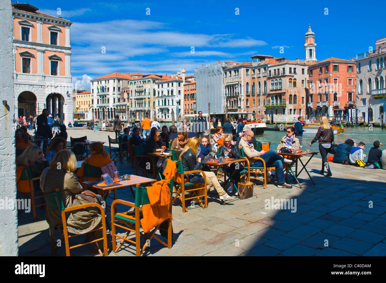 Cafe bar terrace by Canal Grande canal San Polo district Venice Italy ...