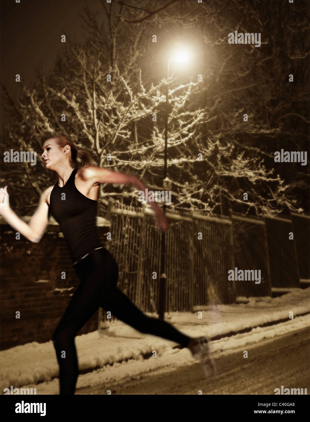 Running in snow Stock Photo - Alamy