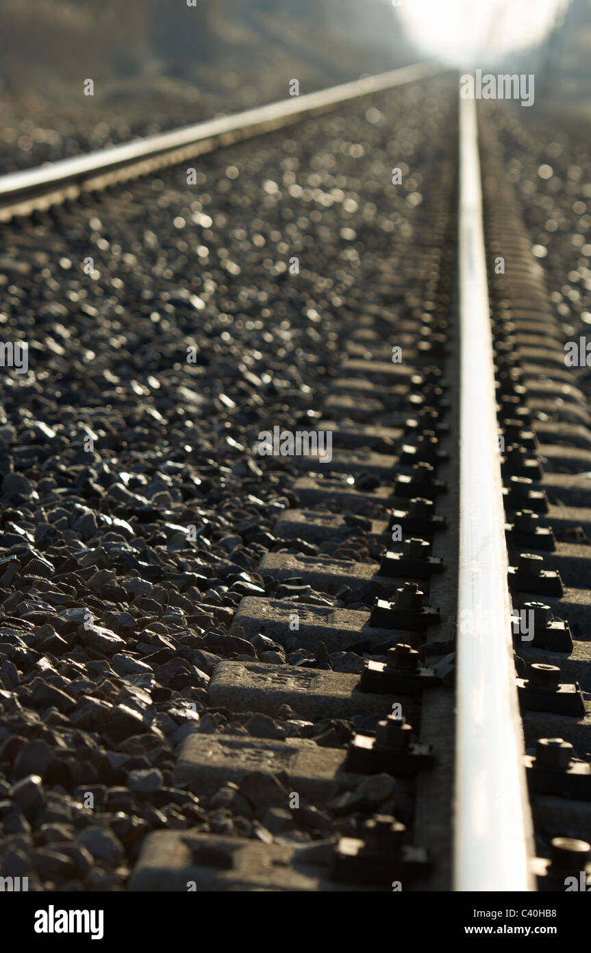 detail of a train line backlit Stock Photo - Alamy