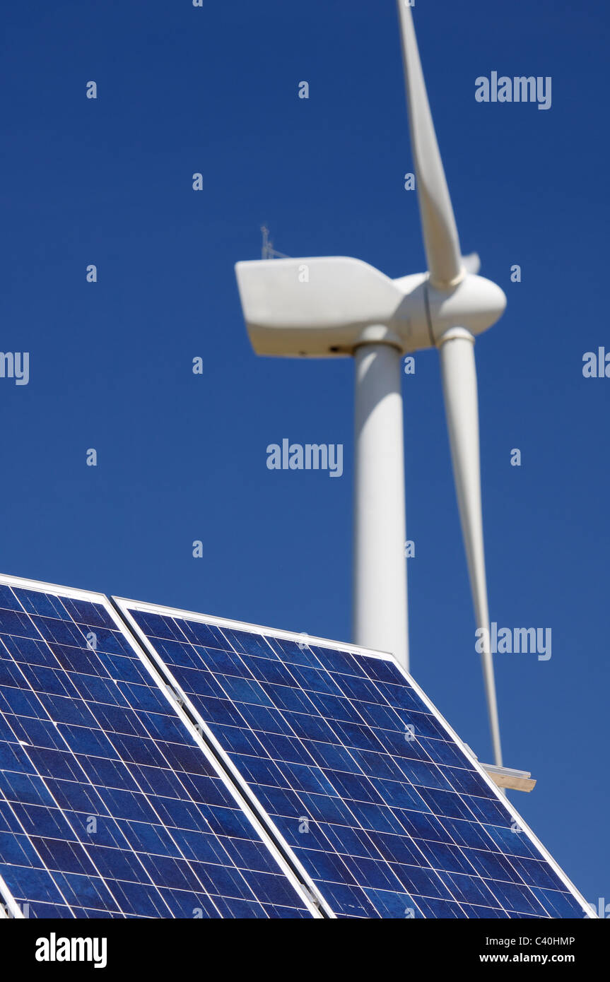 windmill and solar panel with a clear blue sky Stock Photo - Alamy