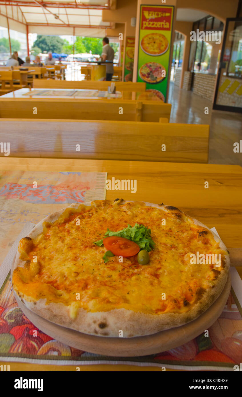 Pizza in pizzeria in harbour of Porec the Istrian peninsula Croatia ...