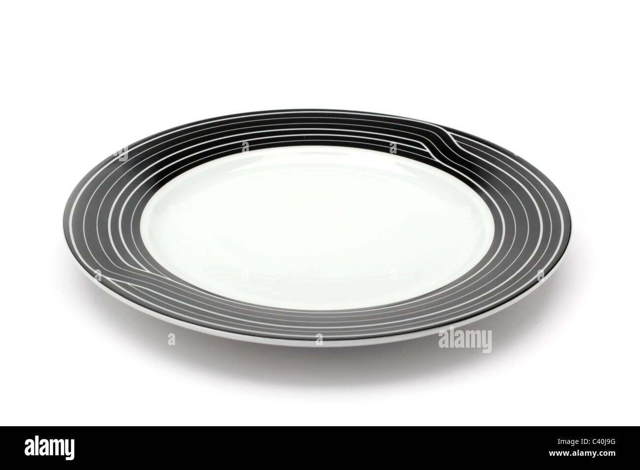 Empty plates table Cut Out Stock Images & Pictures - Alamy