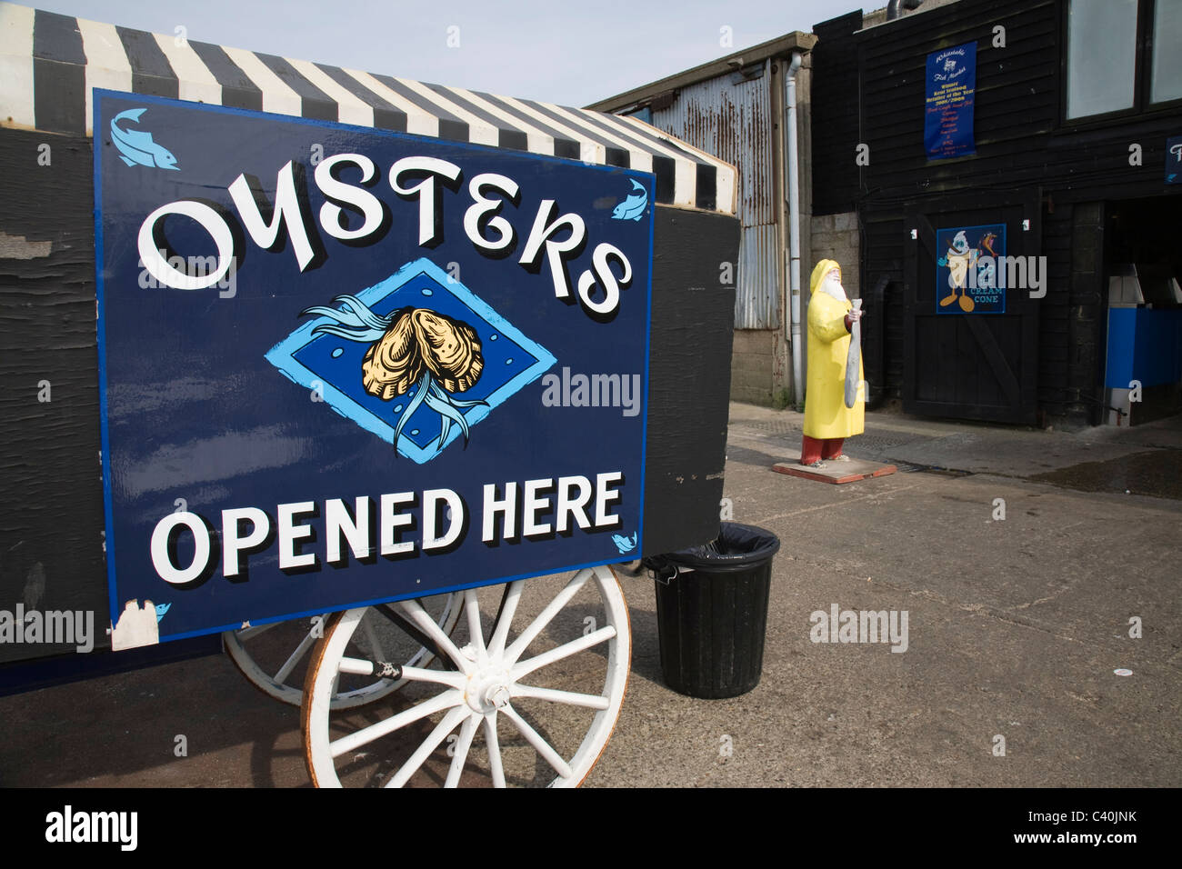 The Fish Market & Oyster Cart on Whitstable harbour quayside Stock ...