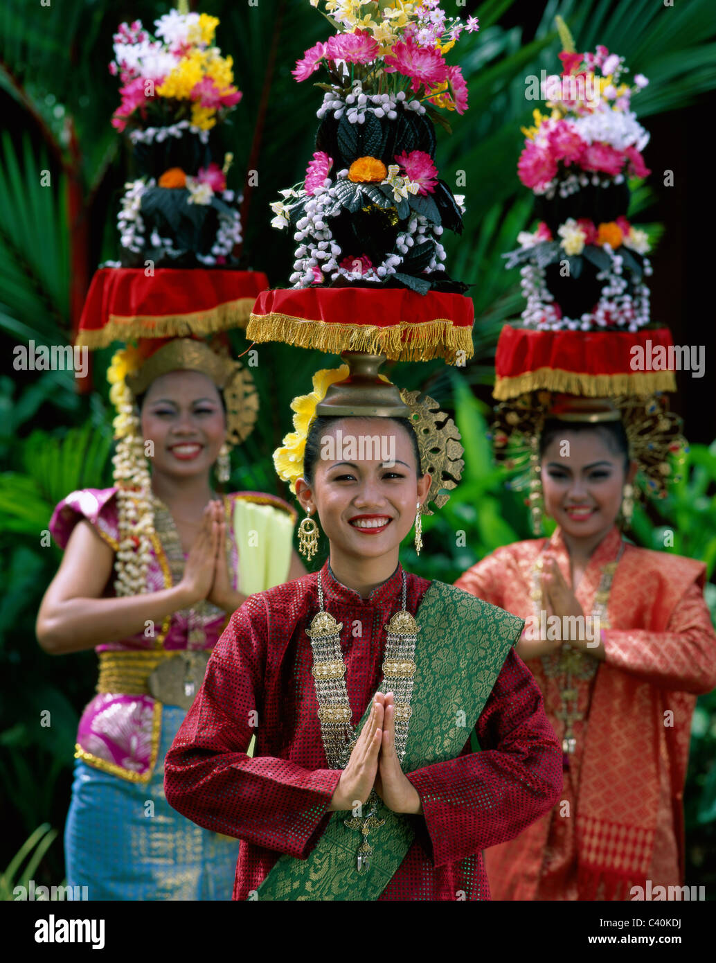 Asia asian costumes headdress holiday hi-res stock photography and ...