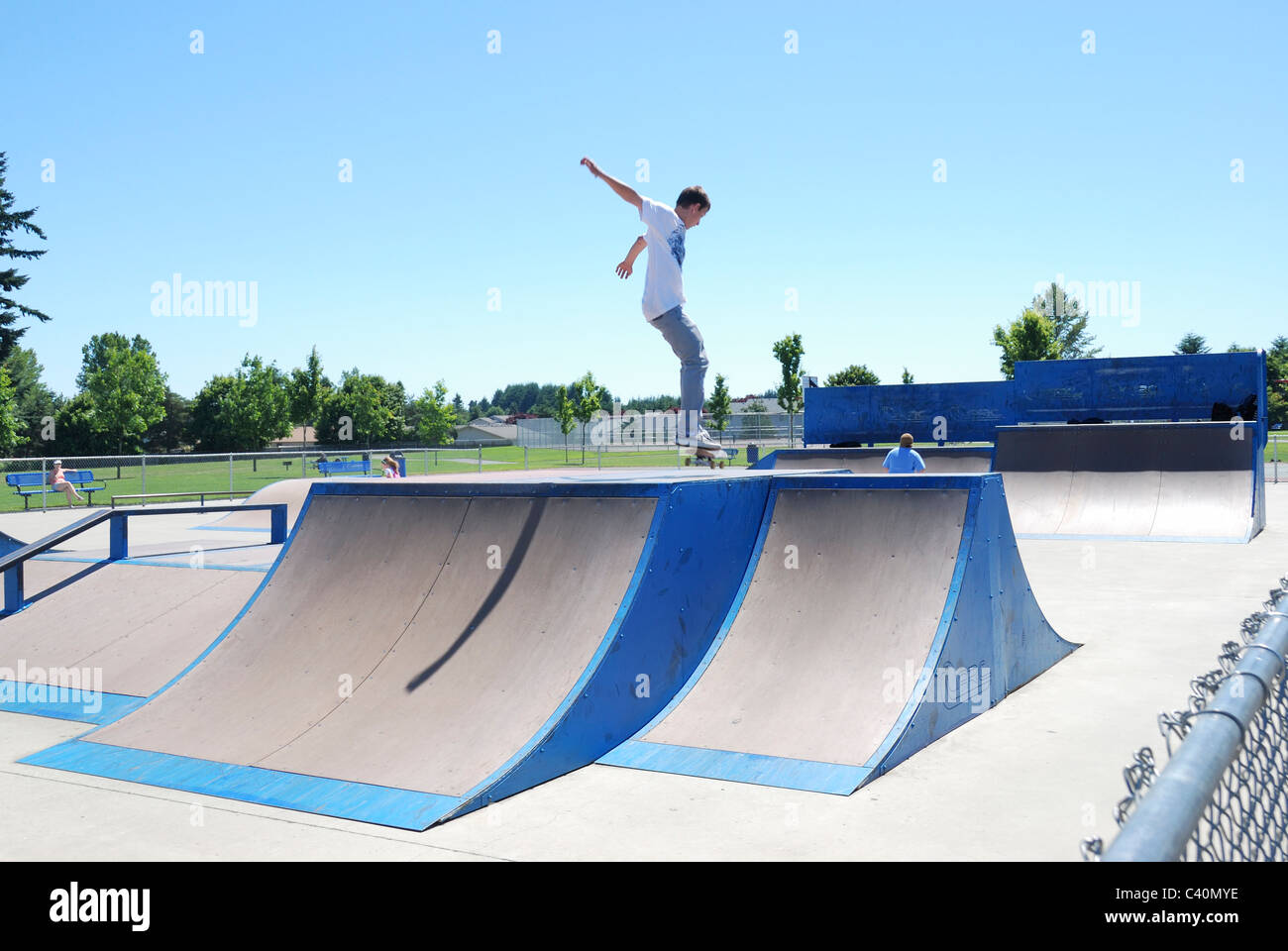 Skateboard rider at skateboard park Stock Photo - Alamy