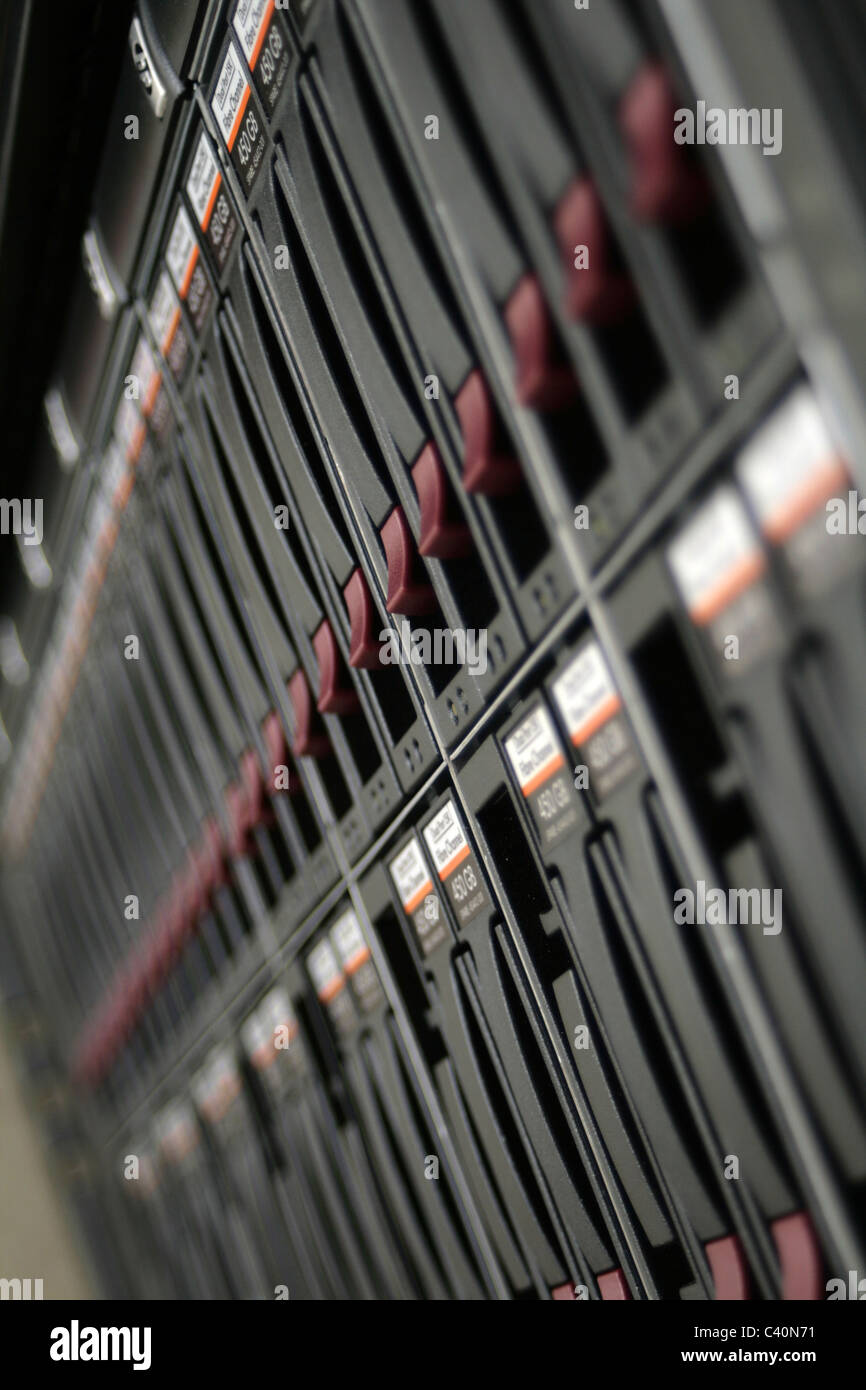 Hard drives in a row in a datacenter Stock Photo - Alamy