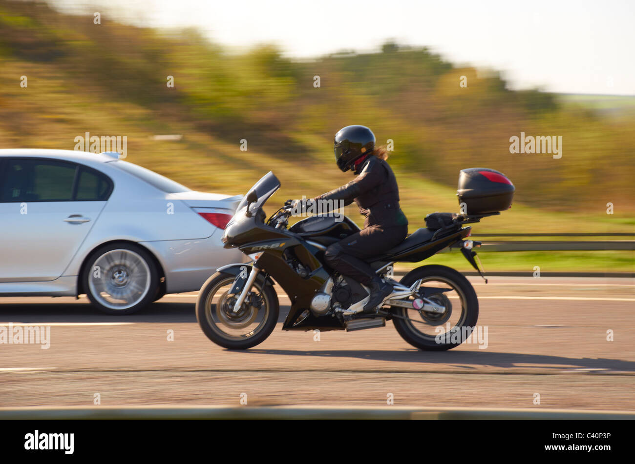 Biker on the M62 motorway (near Outlane, Huddersfield Stock Photo - Alamy