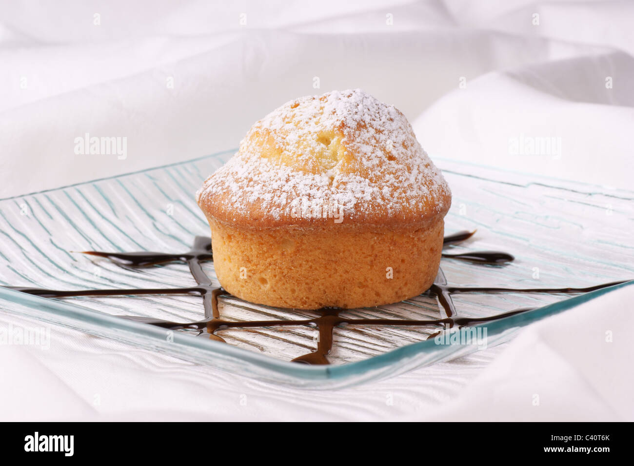 Homemade muffin served on a glass plate Stock Photo - Alamy