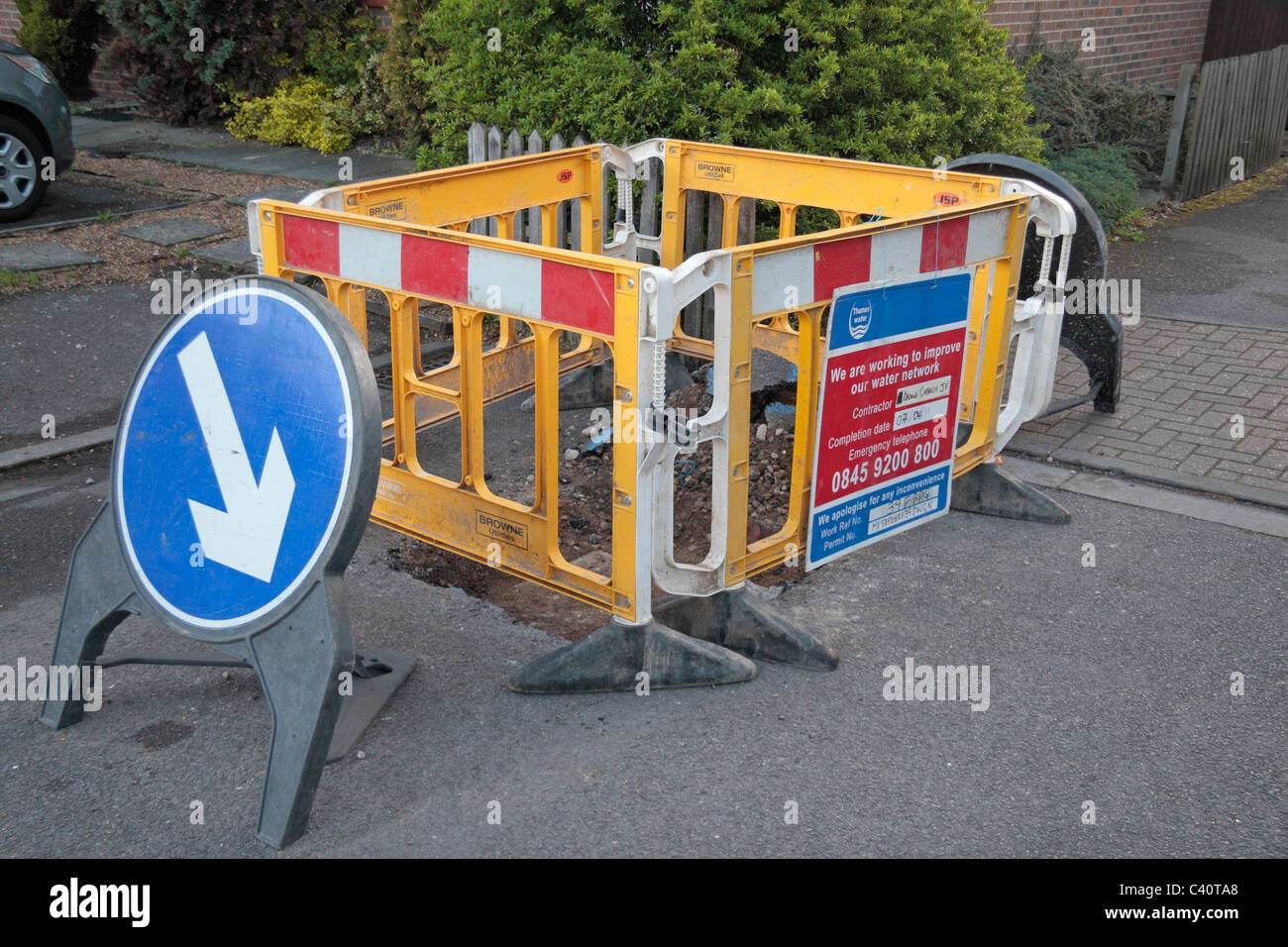 Thames Water plc road works on a residential road in Hounslow, Middx ...