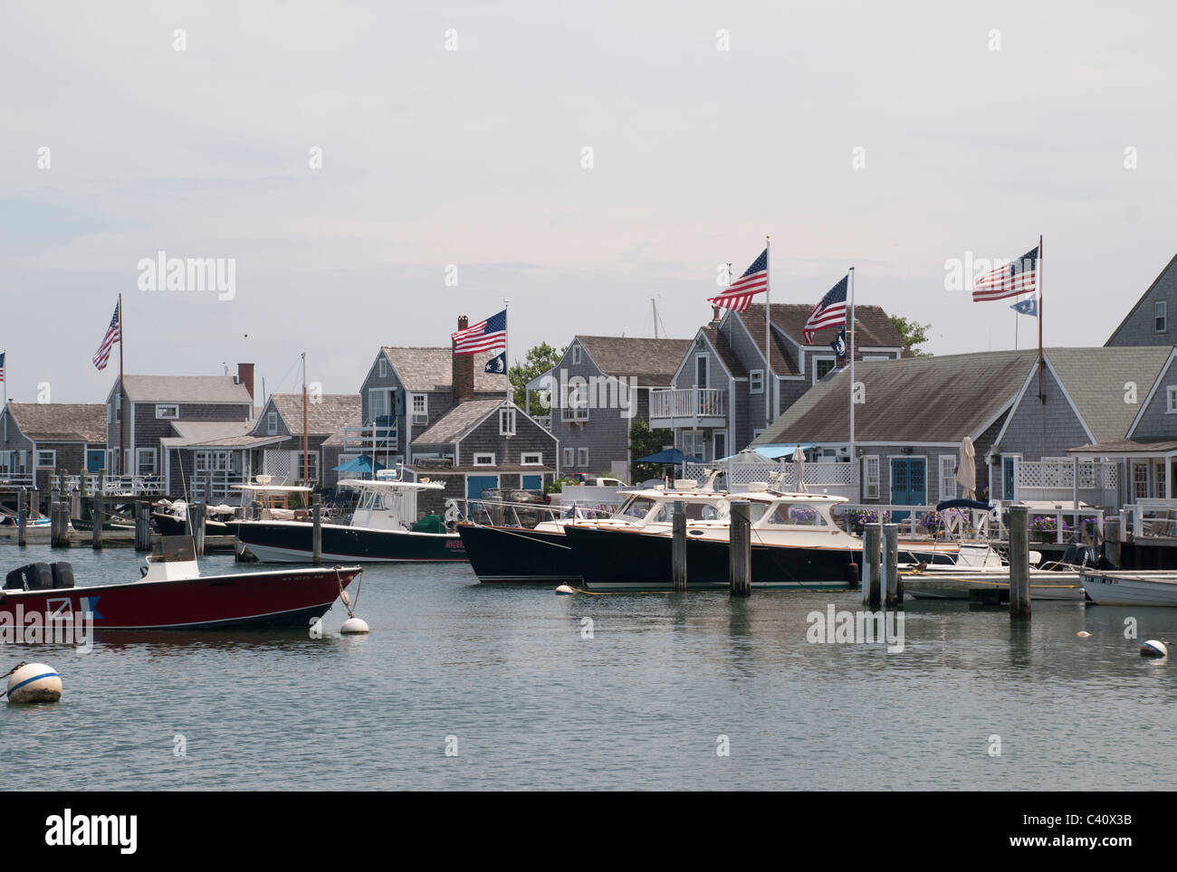 Homes and boat on the Nantucket Town harbor Stock Photo - Alamy