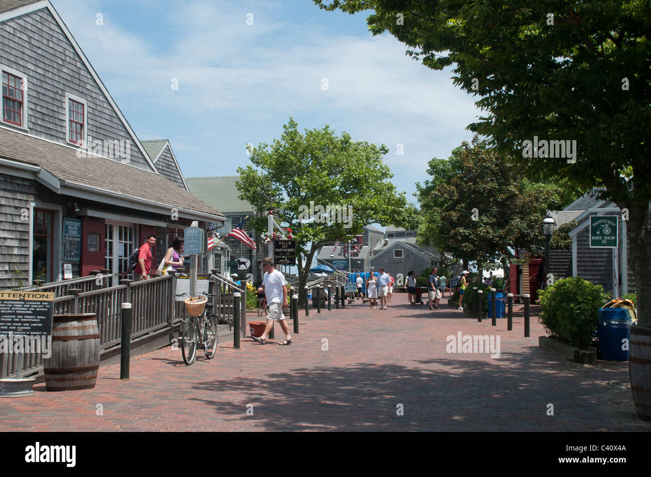 People walk past shops in Nantucket Town Stock Photo - Alamy