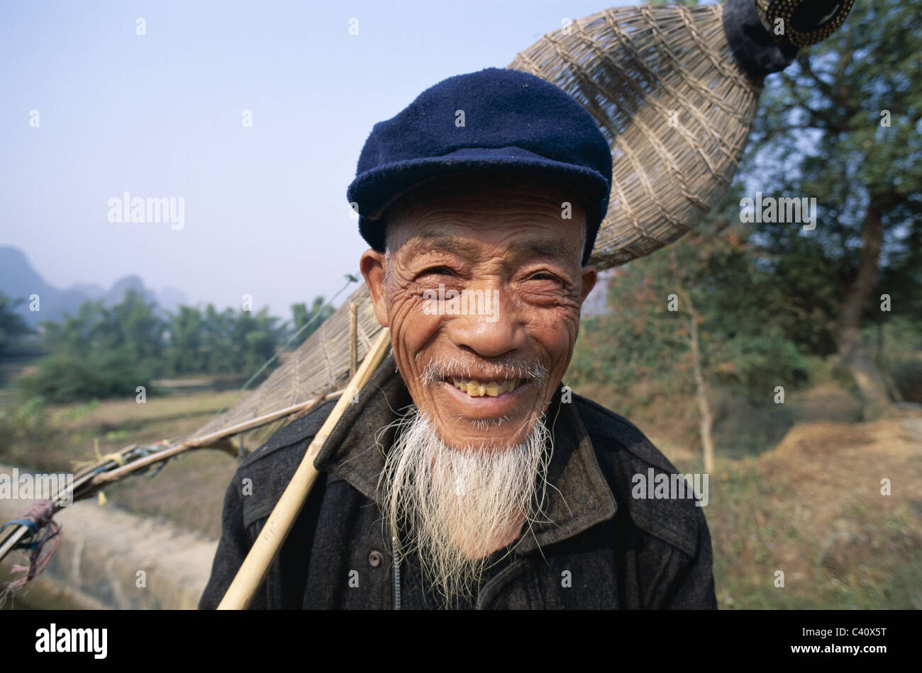 Elderly fish farmer traditional fishing hi-res stock photography and ...