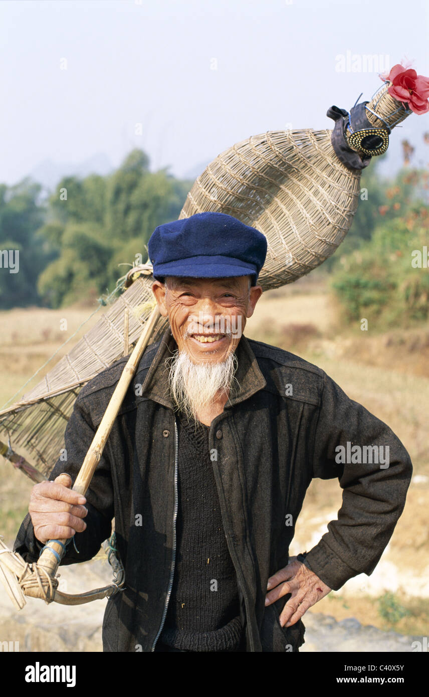 Elderly fish farmer traditional fishing hi-res stock photography and ...