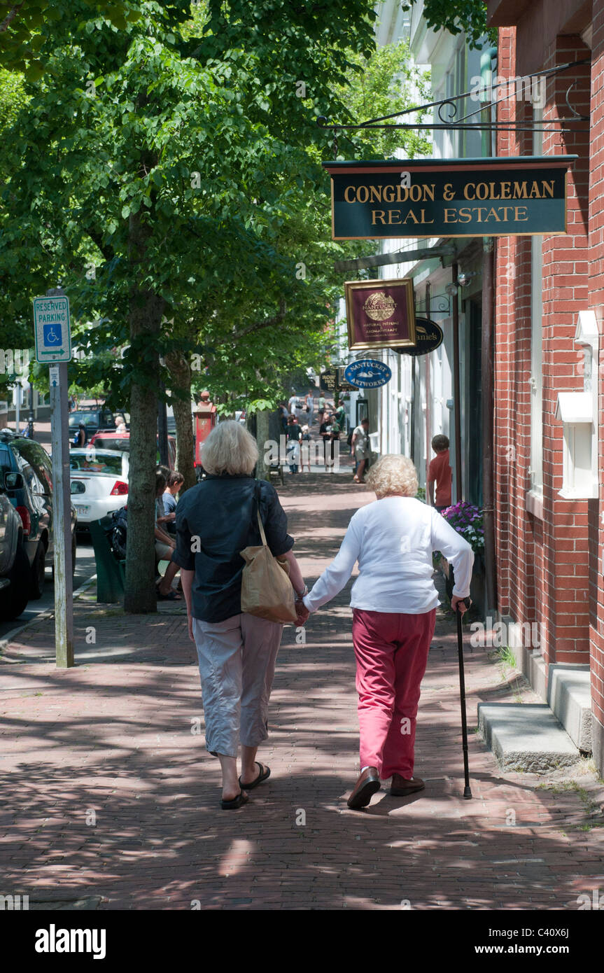 People walk past shops in Nantucket Town Stock Photo - Alamy