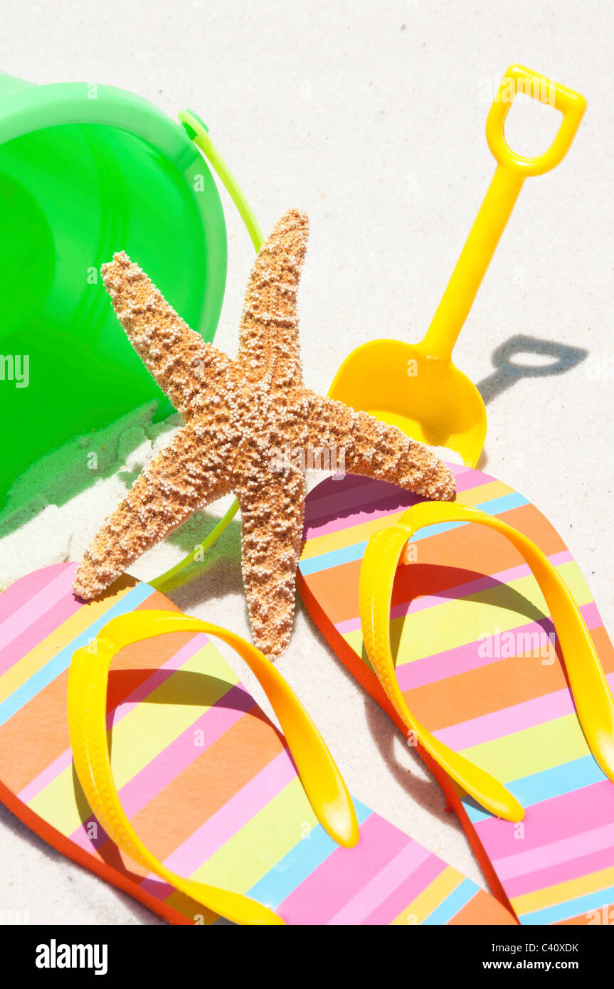 flip flops on beach sand Stock Photo - Alamy