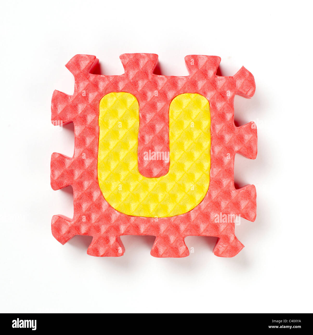 alphabet puzzle piece U Stock Photo - Alamy