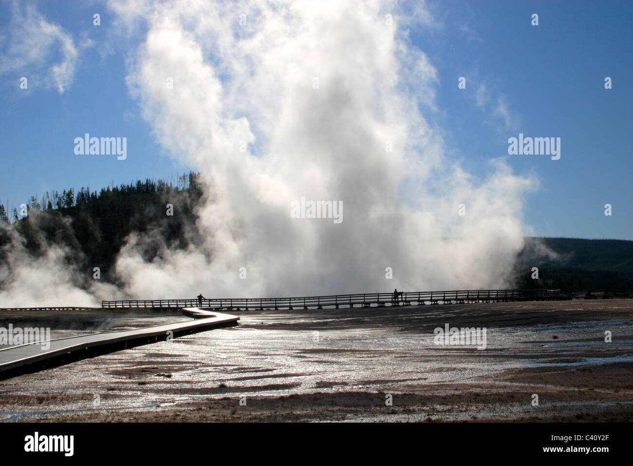 Steam rises from Excelsior Geyser in Yellowstone's Midway Geyser Basin ...