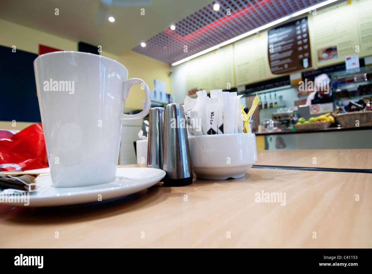 mug of tea on a formica table in a cafe Stock Photo - Alamy