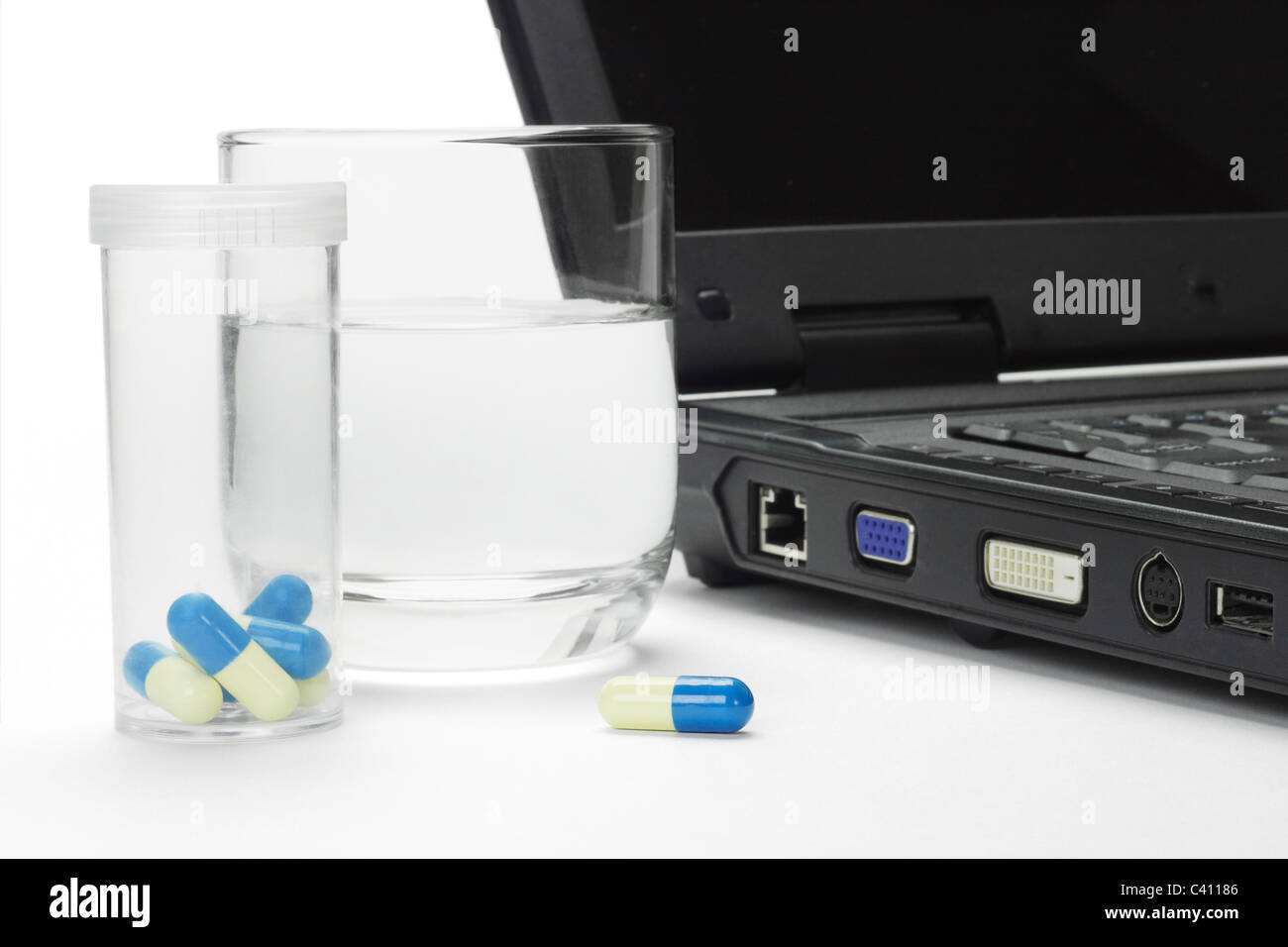 Glass water next laptop hi-res stock photography and images - Alamy