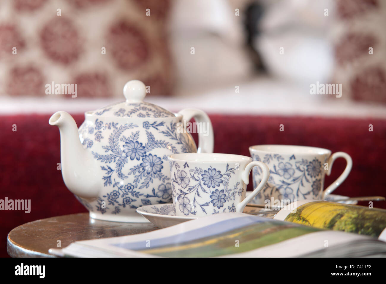 teapot and cups on a table Stock Photo - Alamy