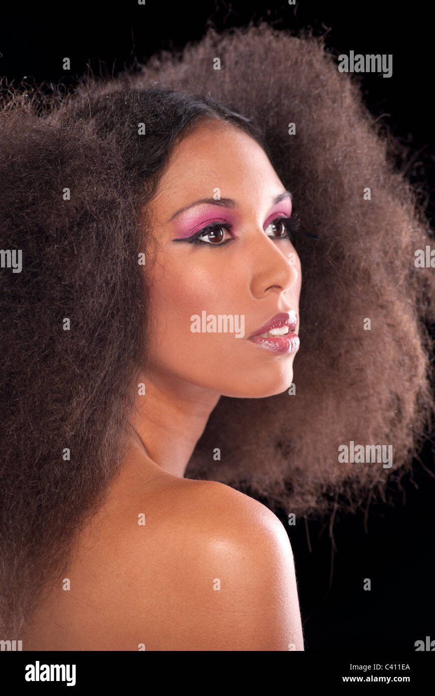 young black female model with curly frizzy hair Stock Photo - Alamy