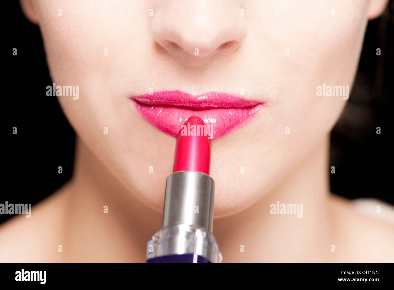 Applying lipstick hi-res stock photography and images - Alamy