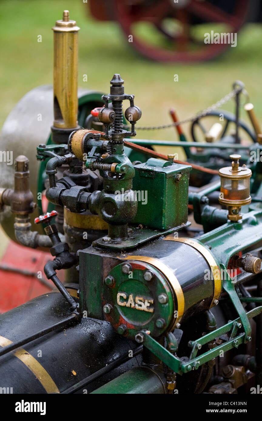 Closeup view of a part of a miniature steam driven traction engine on ...