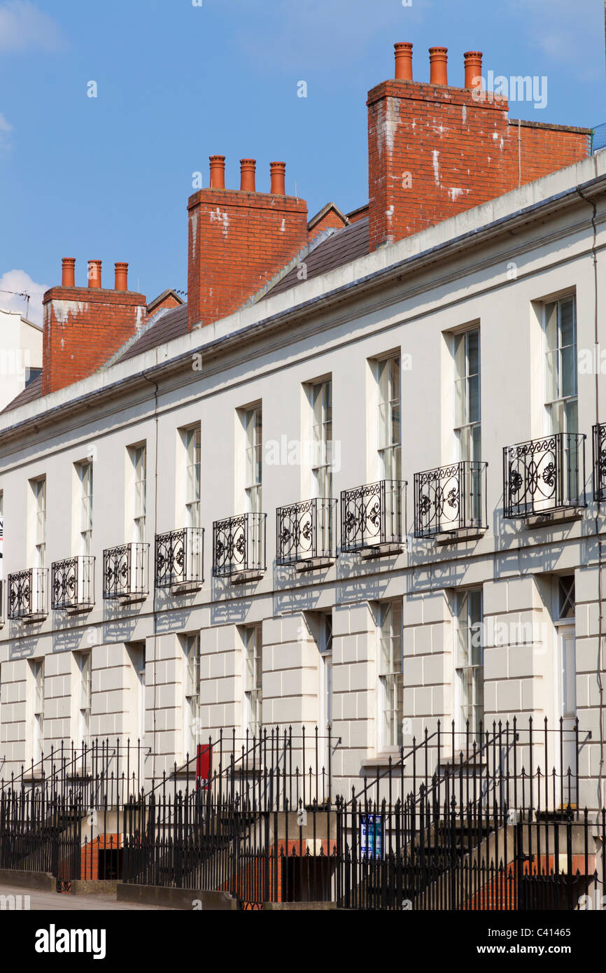 Terrace of traditional regency style Georgian houses with balconies ...