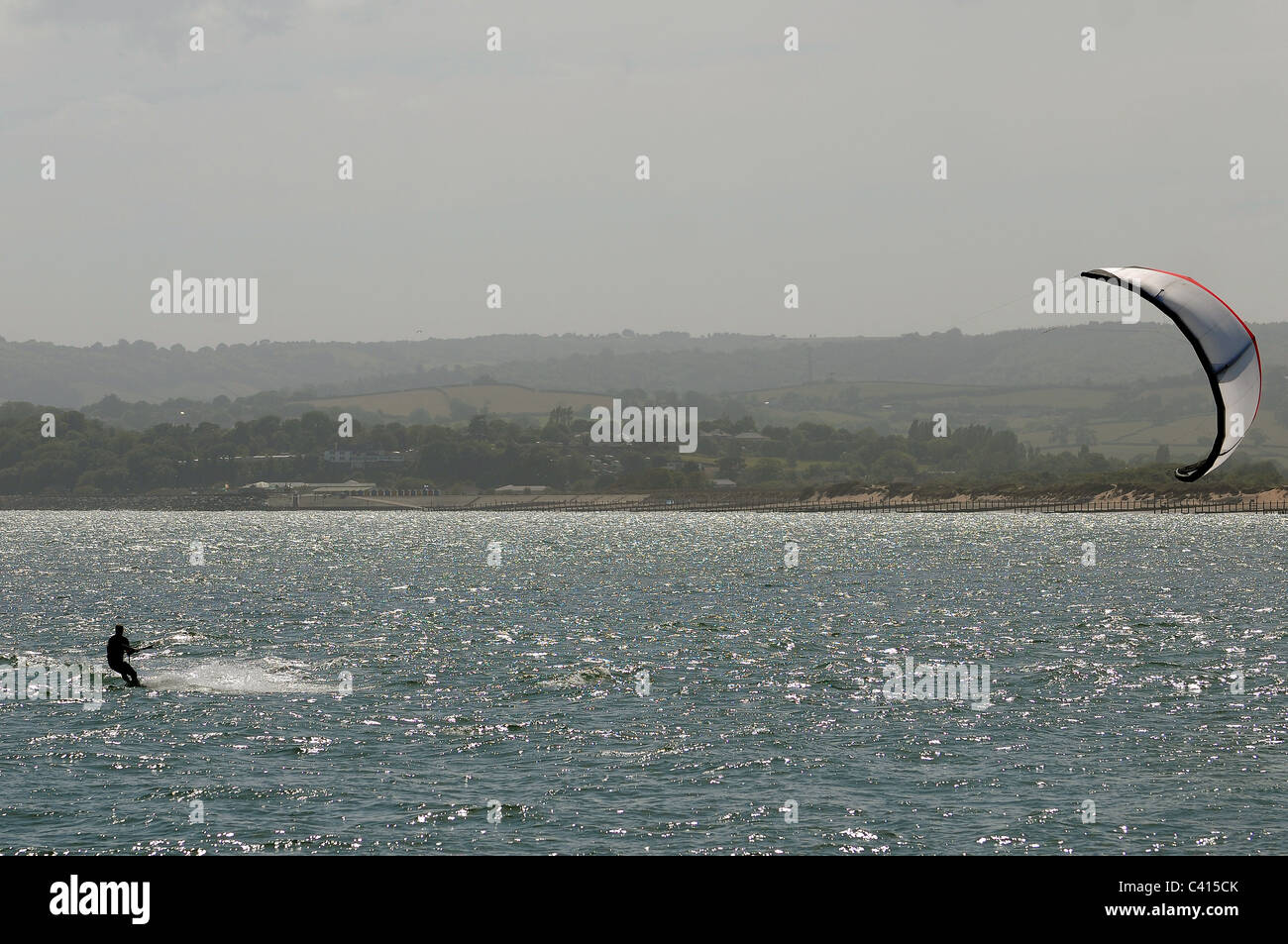 A kite surfer in action in the sea at Exmouth in Devon Stock Photo - Alamy