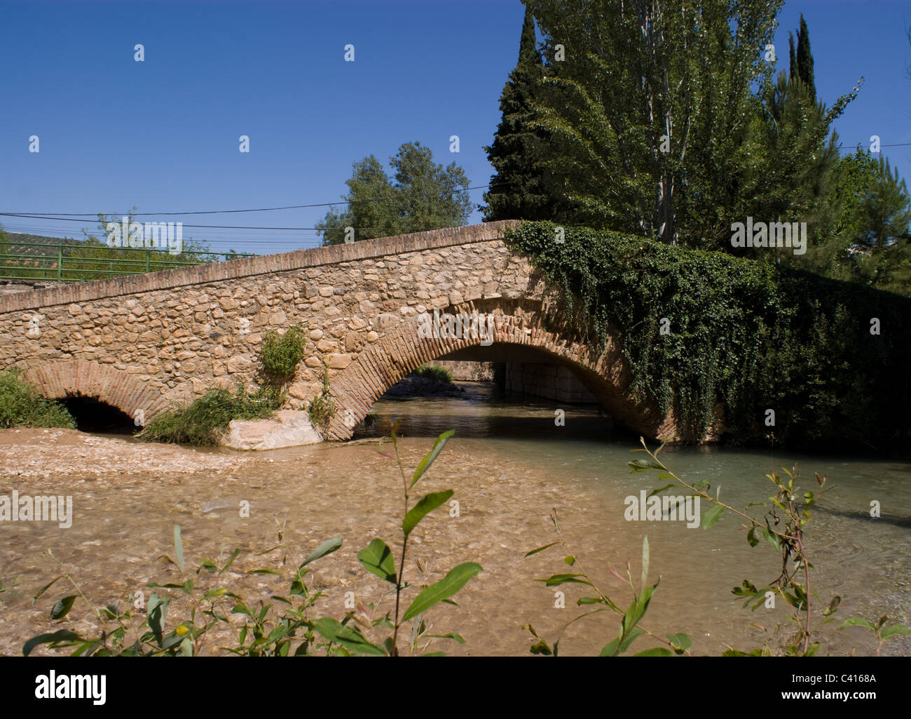 THE CLEAR WATERS OF THE RIO FRIO MEANDERING THEIR WAY DOWNSTREAM PAST ...