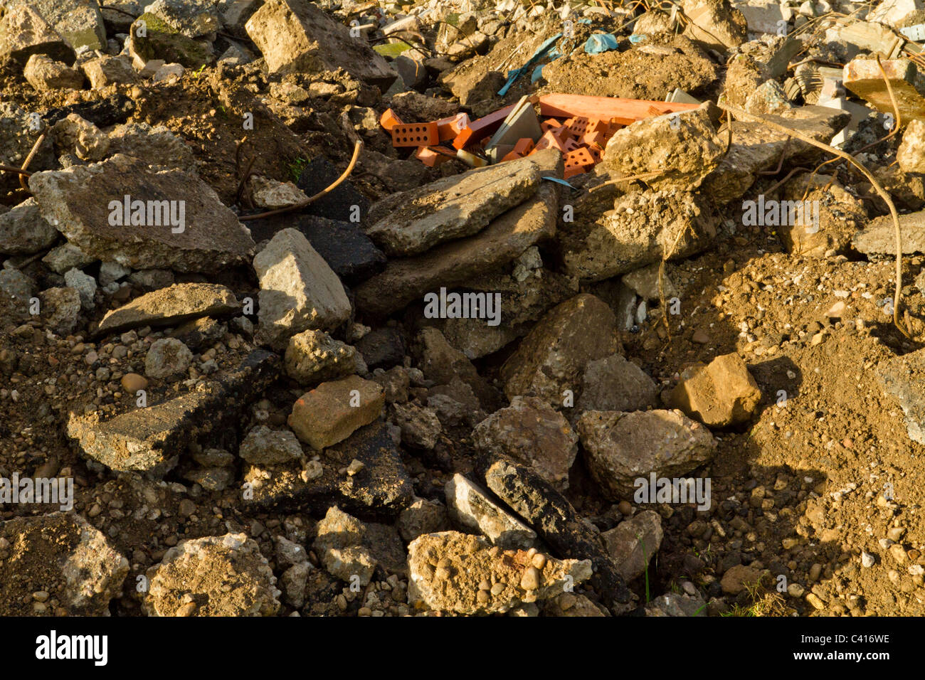 Construction waste. Builder's rubble including pieces of concrete ...