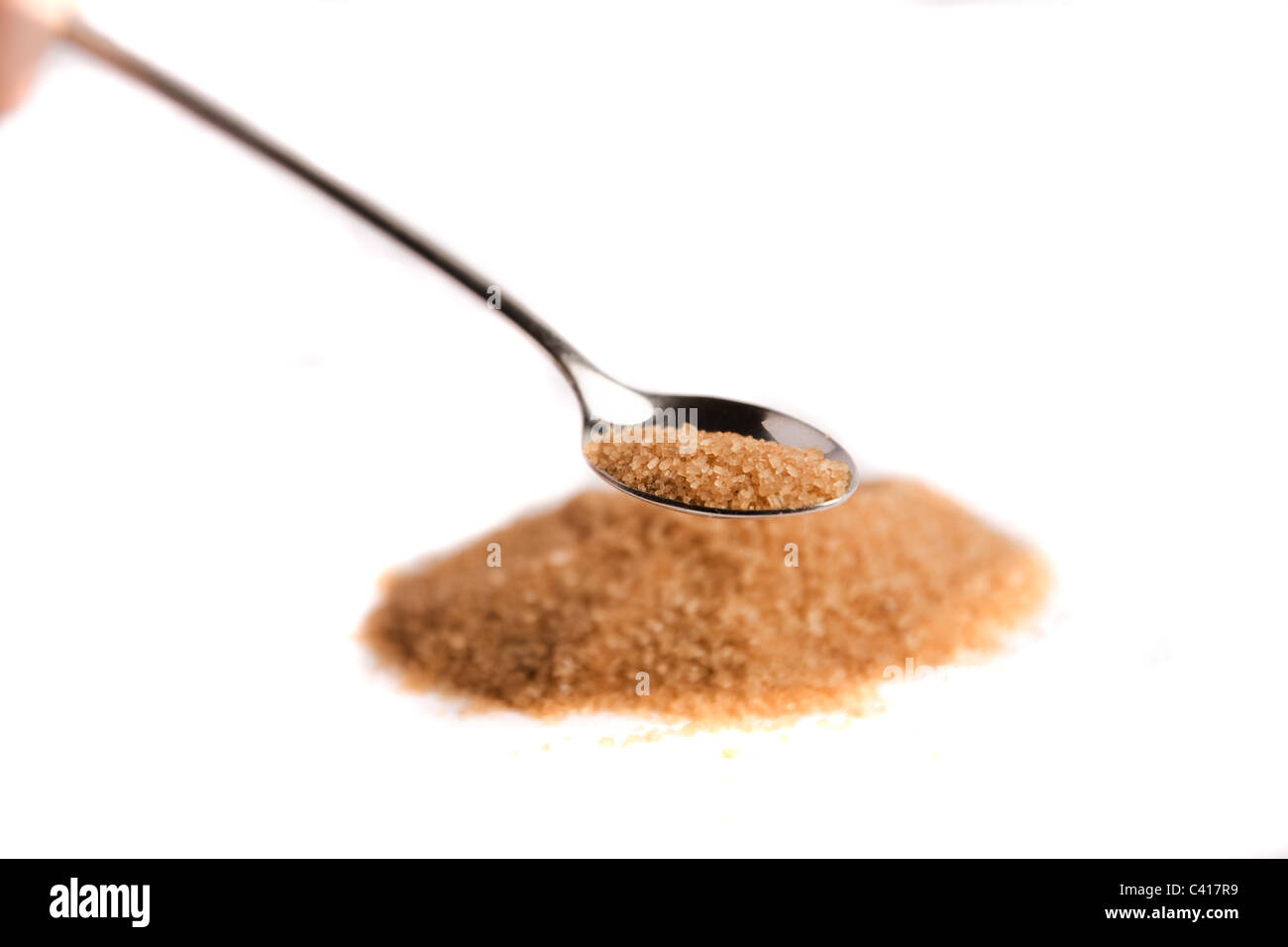 brown sugar on teaspoon Stock Photo - Alamy