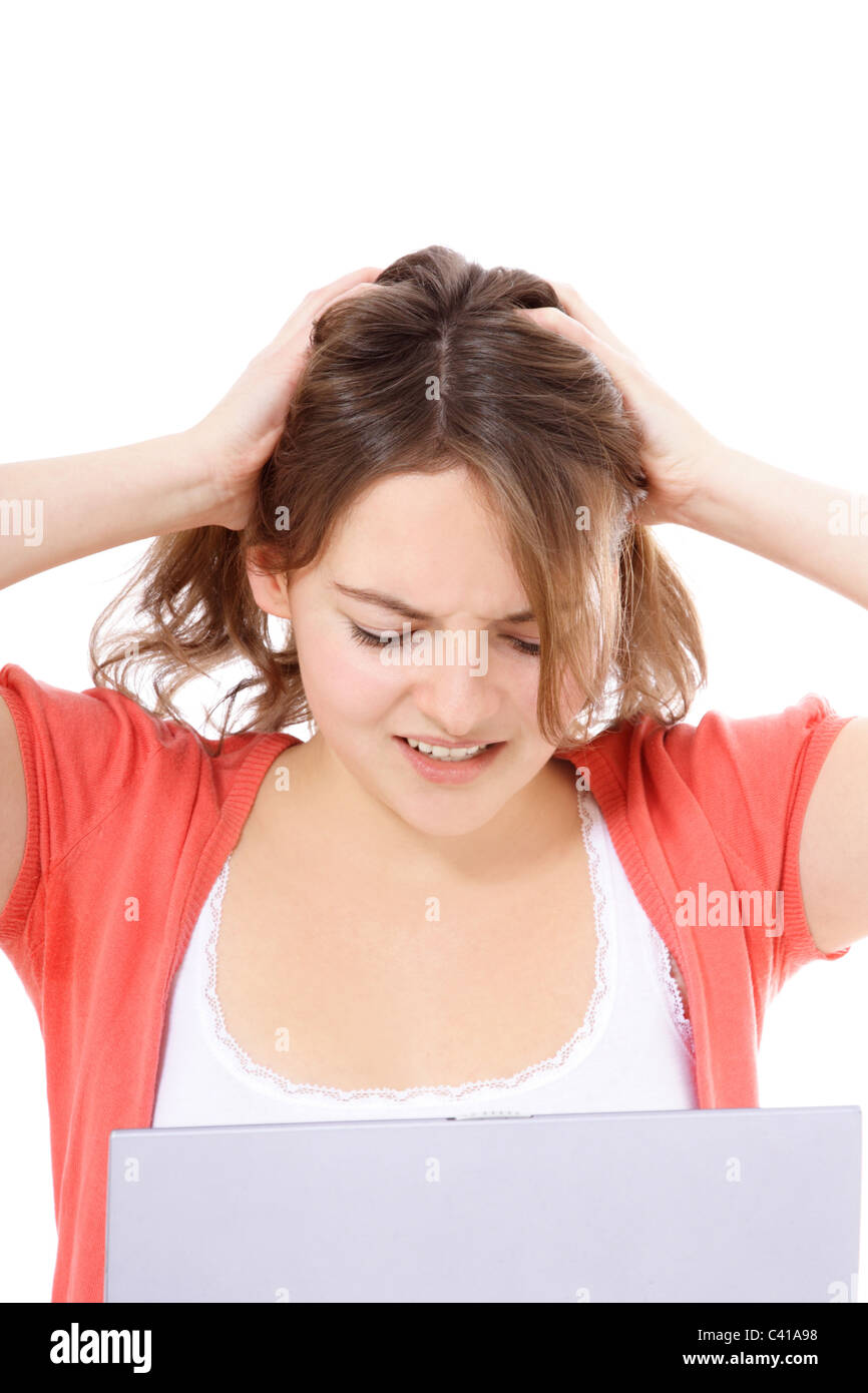 Attractive young woman got a problem with her computer. All on white ...