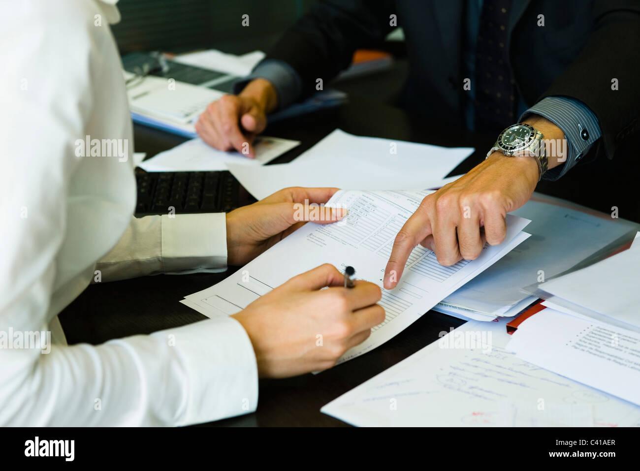 Person Signing Paperwork