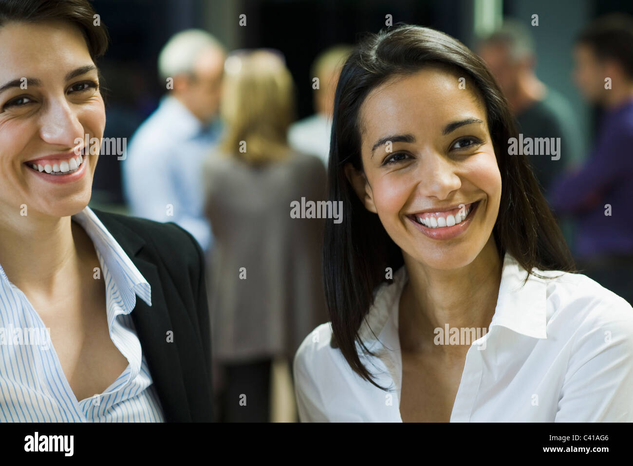 Professional women laughing, portrait Stock Photo - Alamy