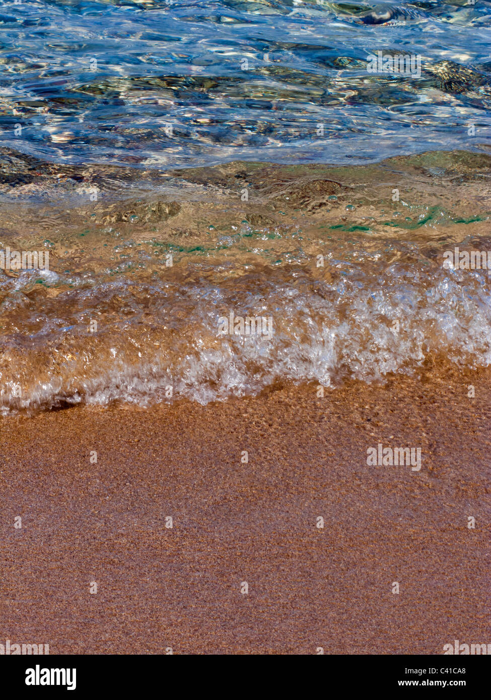 Waves lapping beach hi-res stock photography and images - Alamy